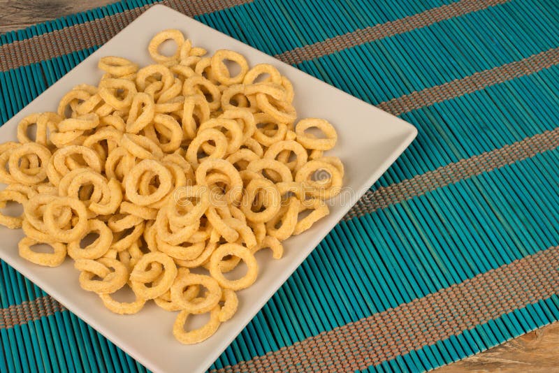 Corn rings on table stock image. Image of salty, golden - 31552381