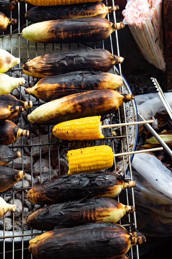Corn roasted on charcoal. stock image. Image of barbecue - 121181525