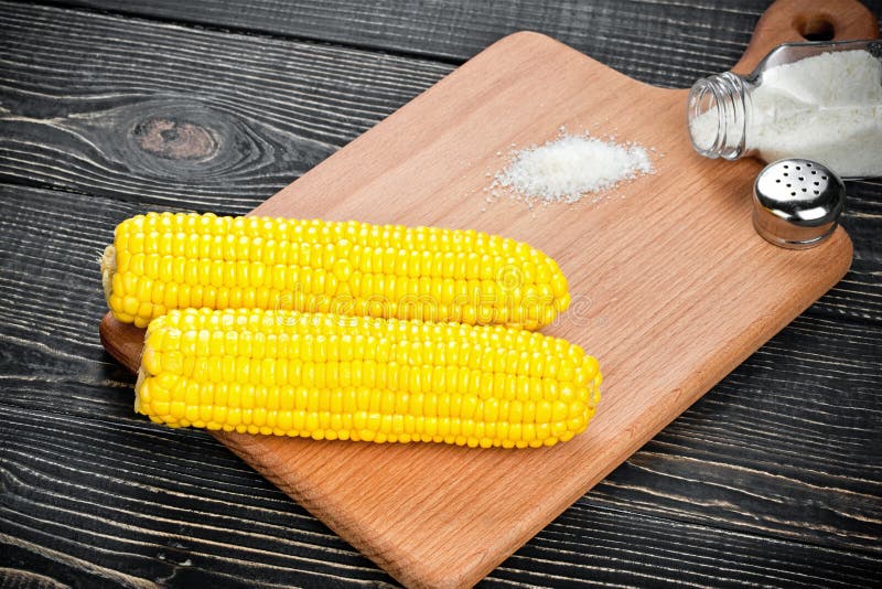 Corn and Salt on a Wooden Table Stock Image - Image of vegetarian, gold ...