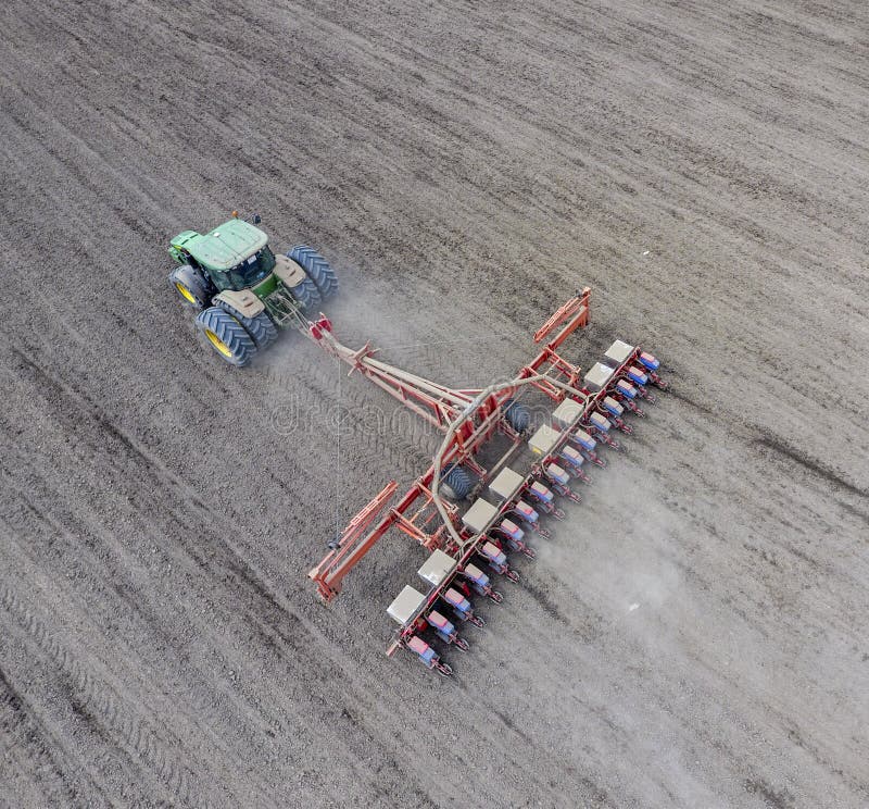 Corn Seeder. Sowing on the Field with a Seeder of Corn Editorial Stock ...