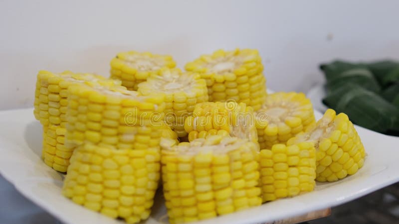 Corn Slices Plate Boiling Corn in Pot with Bubbling Water during ...