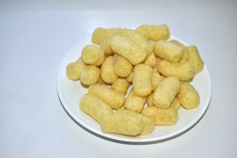 Corn Sugar Sticks Snacks on a White Plate Stock Image - Image of ...