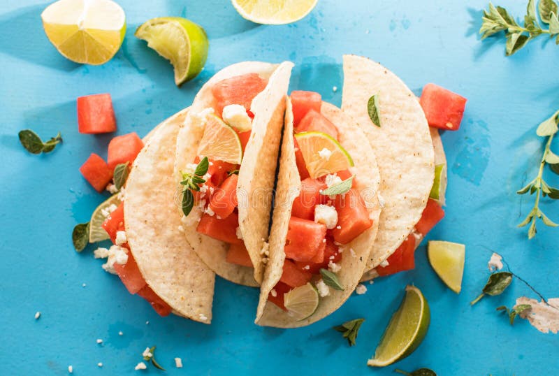 Corn Taco Shell with Watermelon and Feta Salad, Sprinkled Lime Stock ...