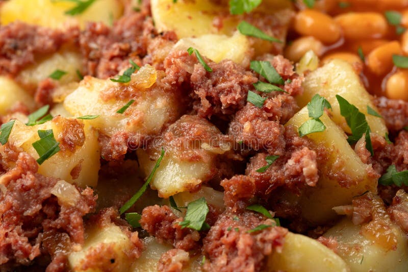 Corned Beef Hash with Potatoes and Beans in Tomato Sauce. Stock Image ...