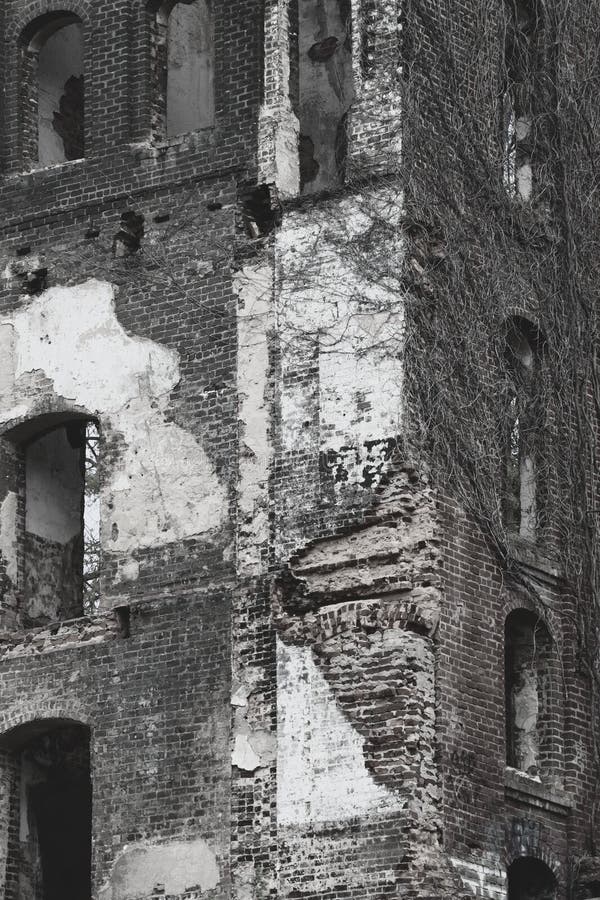 Corner of Abandoned Brick Building with Empty Arched Windows, White ...