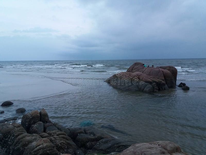 The Top Corner of the Beach Has a Sea of Water Coming To the Shore ...
