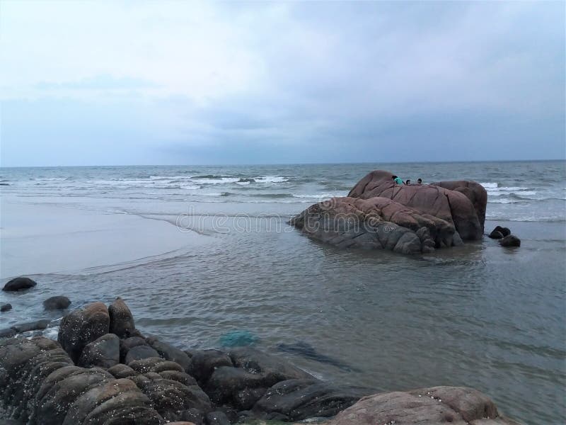 The Top Corner of the Beach Has a Sea of Water Coming To the Shore ...