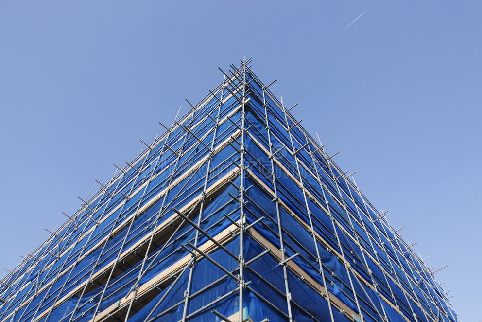 Corner of blue scaffolding stock image. Image of construction - 23055891