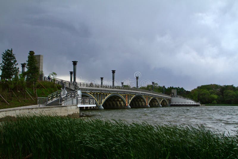 A Corner of a Bridge on the Lake in the Park Stock Image - Image of ...
