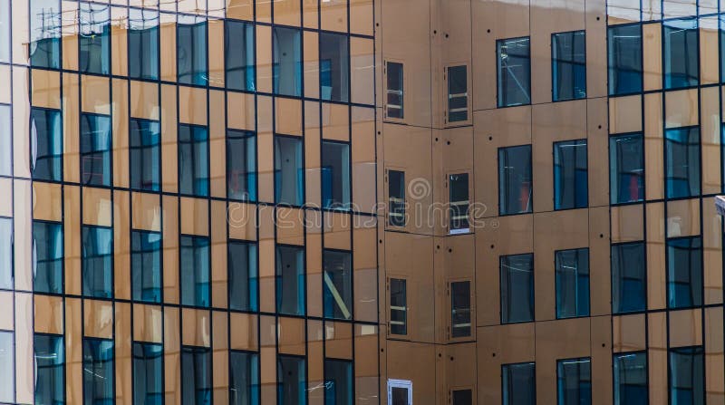 Corner of a Brown Glass and Steel Office Building.. Stock Image - Image ...