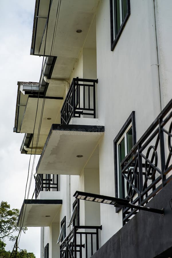 Corner of Classical White Building with Windows and Balconies Downtown ...