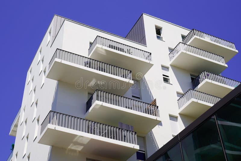 Corner of Facade Apartment Building with Many Windows Balcony Against ...