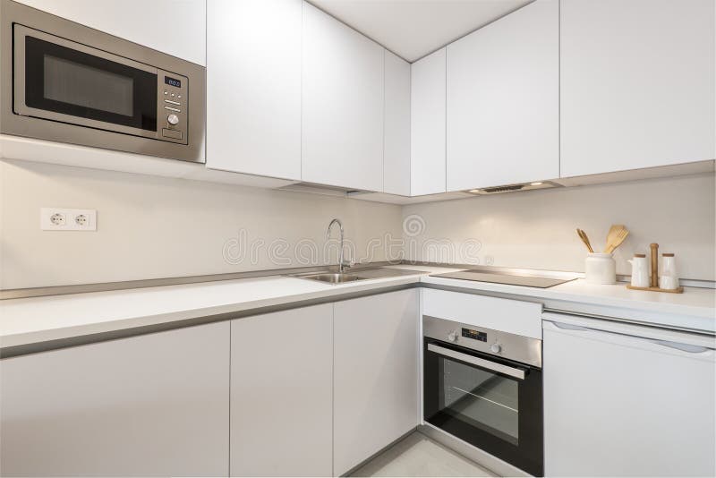 Corner of a Fitted Kitchen with Contemporary Decoration with Handleless ...