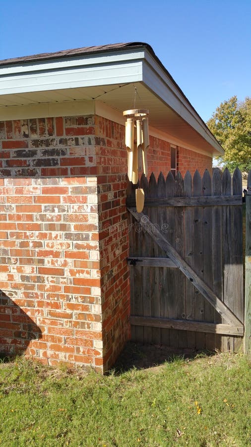 Corner House by Wooden Gate Stock Image - Image of house, corner: 79274831