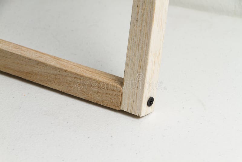 Corner Made with Raft Wood Sticks with Black on a White Table. Stop To ...