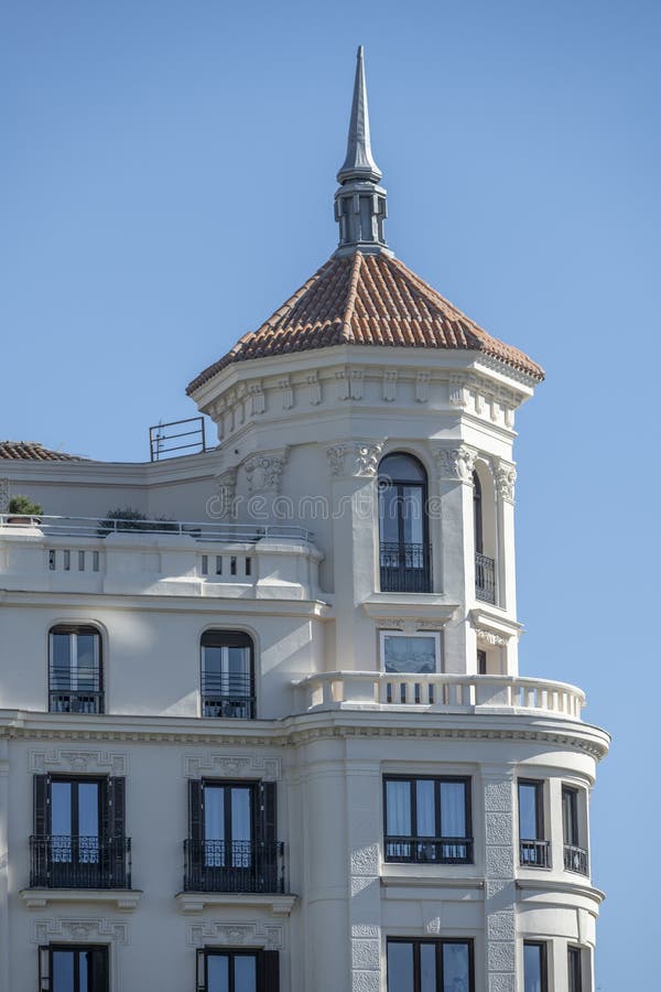 Corner of an Old Monumental Building with Tower and Pointed Dome on a ...
