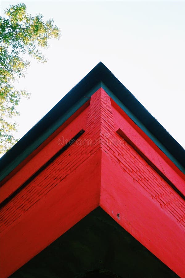 Corner of red building stock photo. Image of building - 108316544