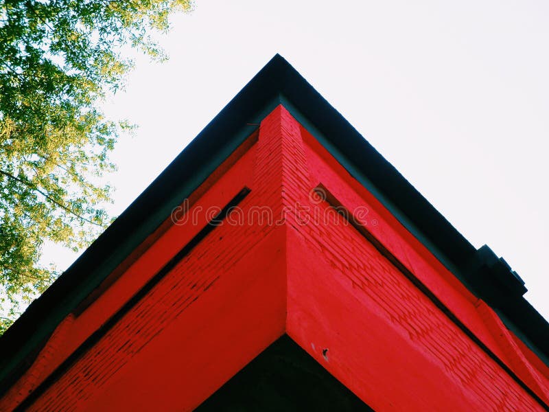 Corner of red building stock image. Image of building - 108316611