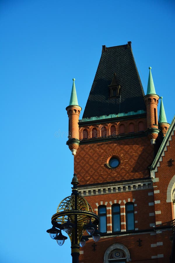 Brick House with a Corner Tower Stock Photo - Image of upper, roof ...
