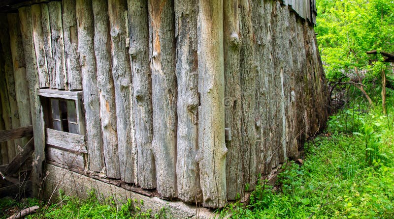 Corner of Unique Barn with Vertical Logs Stock Photo - Image of wall ...