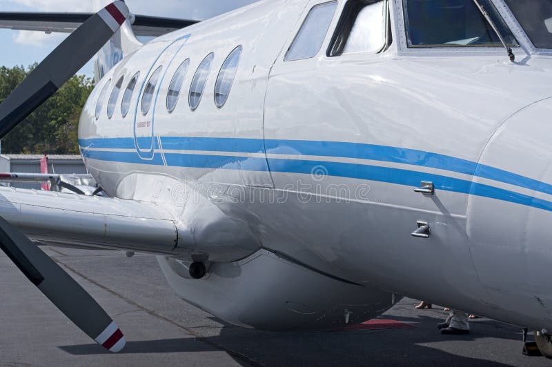 Exterior Co-pilot Side of a Charter Plane Stock Photo - Image of ...
