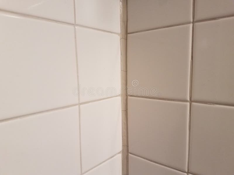 Corner in White Tile Bathroom with White Calk Stock Photo - Image of ...