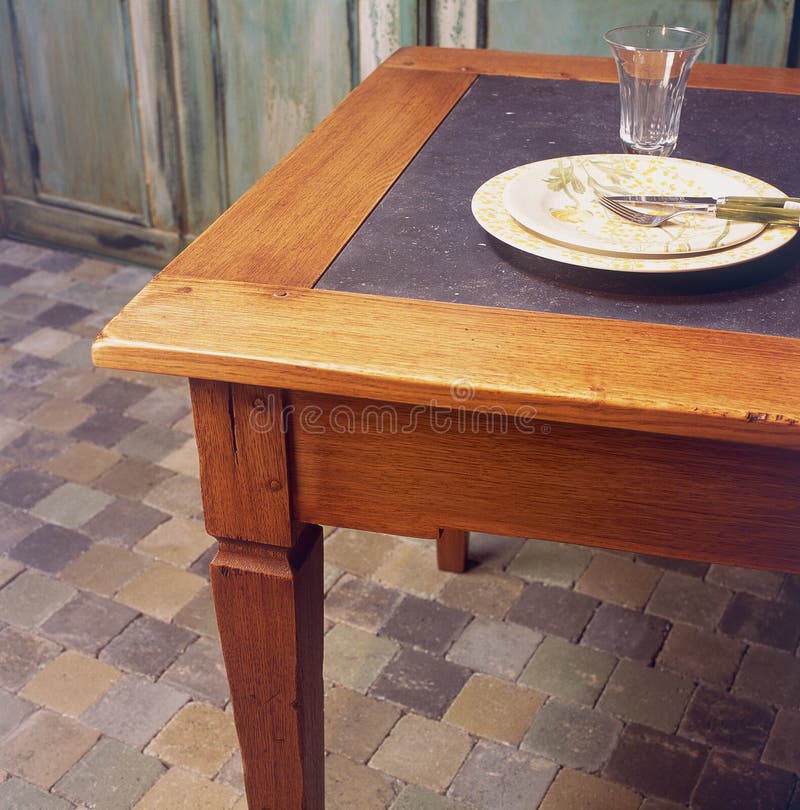 Corner from Wood and Marble Table with Plates Stock Image - Image of ...