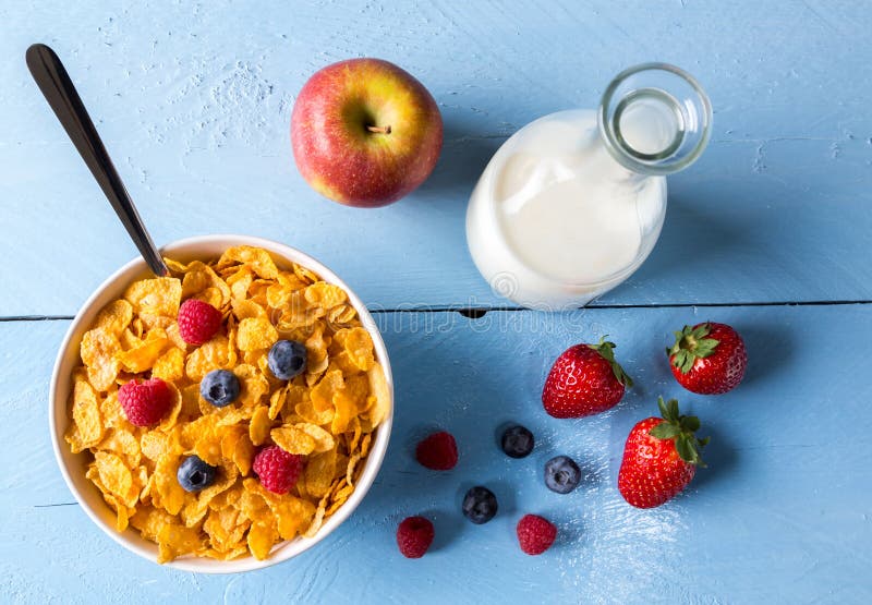 Cornflakes in a Bowl with Milk and Fruits Stock Photo - Image of ...