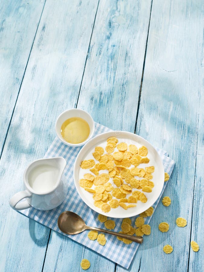 Cornflakes Cereal and Milk. Stock Photo - Image of spoon, honey: 64114370
