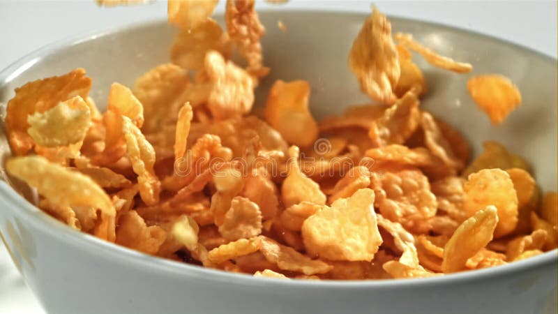 Cornflakes Fall into a Plate. Filmed on a High-speed Camera at 1000 Fps ...