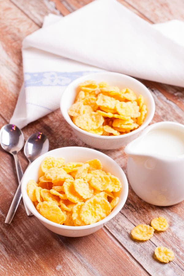 Cornflakes and Milk for Breakfast Vertical Closeup Stock Photo - Image ...