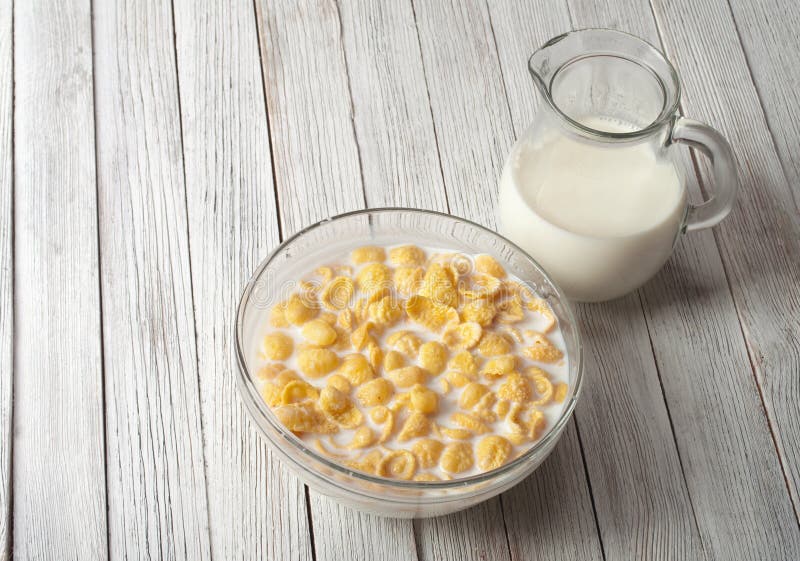 Cornflakes with milk stock image. Image of milk, dieting - 70932531