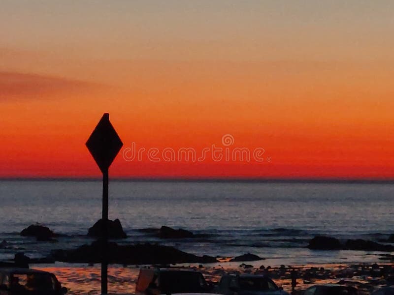 Cornish Sunset with sign stock image. Image of afterglow - 258808891