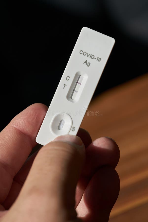 Corona Antigen Rapid Test with a Positive Test Result Stock Photo ...