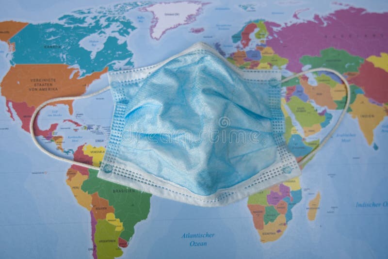Corona Breath Mask on a World Map, Focus on Mask Stock Image - Image of ...