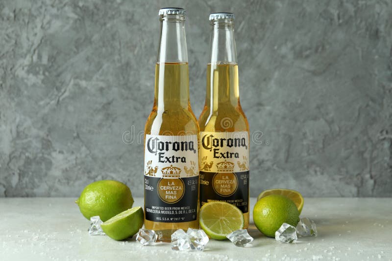 Corona Extra and Ingredients Against Gray Textured Background Editorial ...