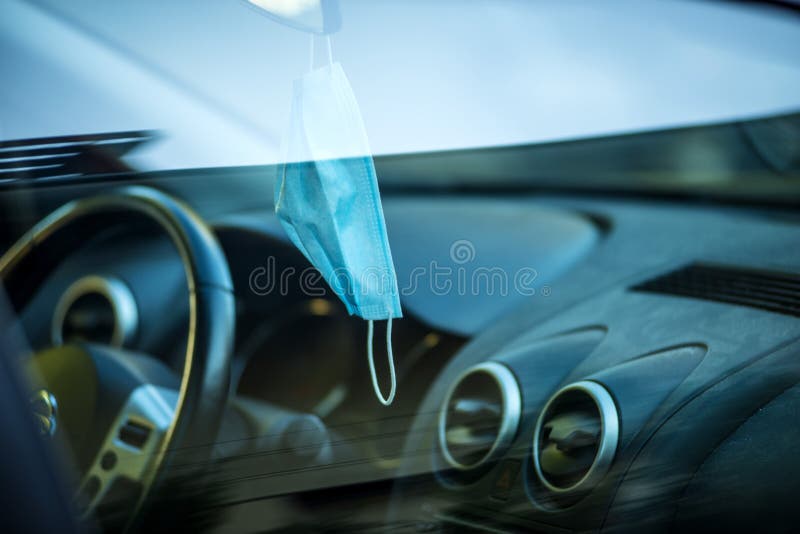 Corona, Medical Face Mask in a Car Stock Photo - Image of guard ...