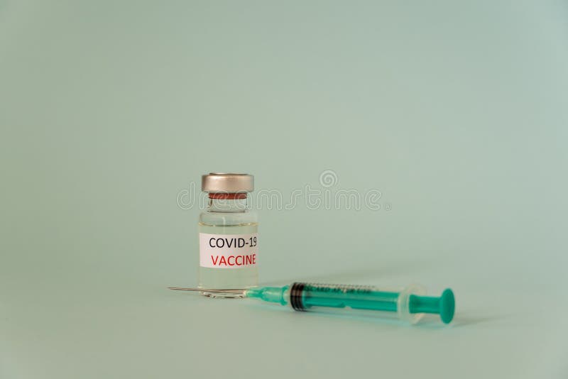 Coronavirus COVID-19 Injection, Vaccine in a Small Bottle Stock Photo ...