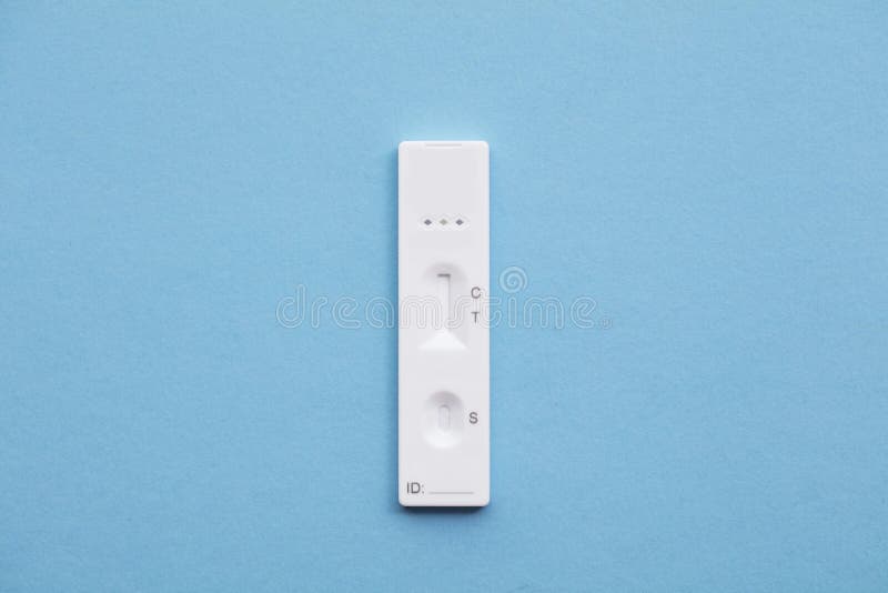 Coronavirus Lateral Flow Home Testing Kit Against a Blue Background ...