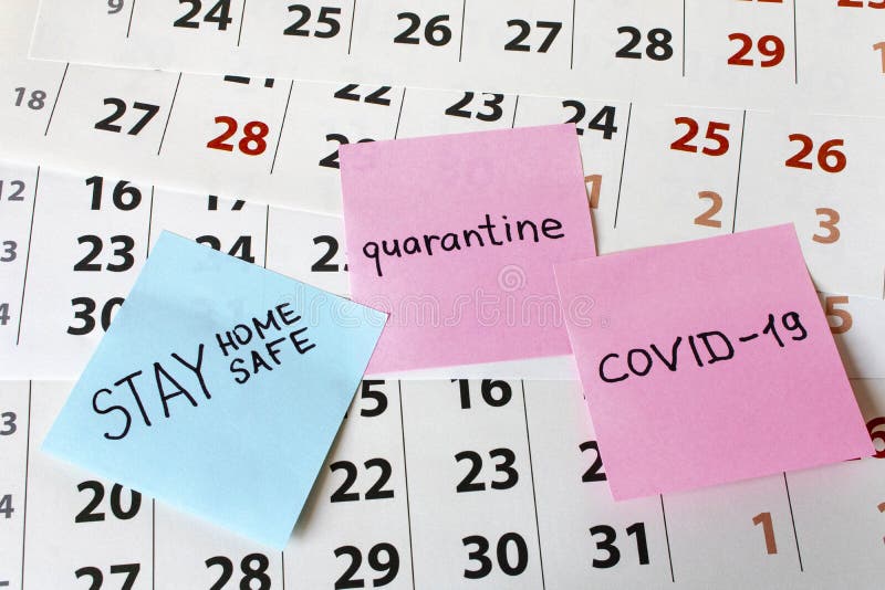 CORONAVIRUS. a Sticker with the Word Quarantine on the Calendar Sheets ...