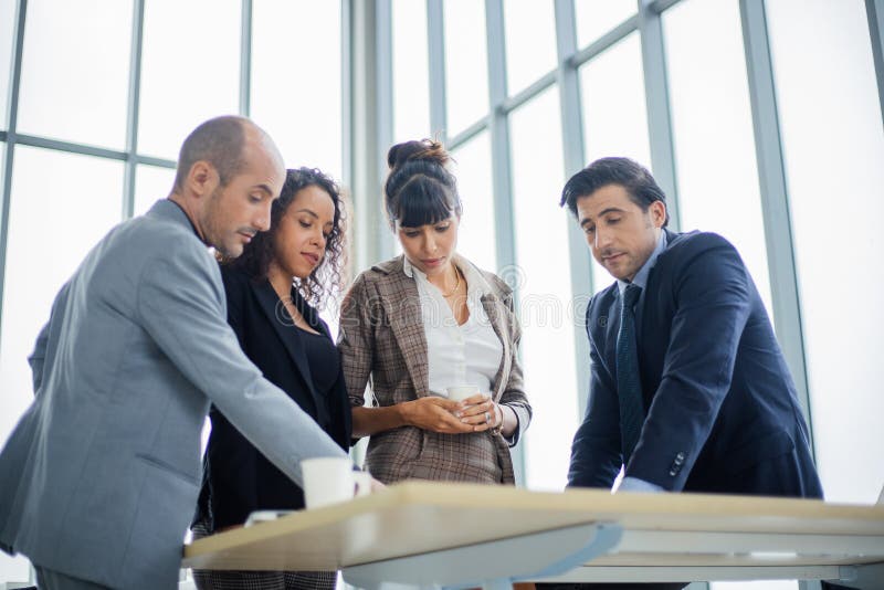 Corporate Business Team and Manager in a Meeting Stock Photo - Image of ...