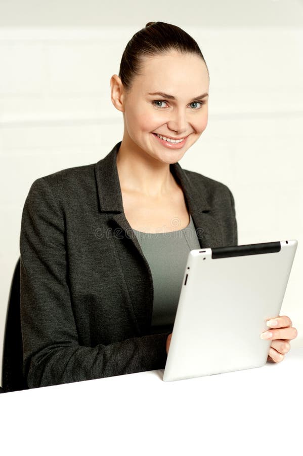Corporate Lady Using Wireless Tablet Device Stock Photo - Image of ...