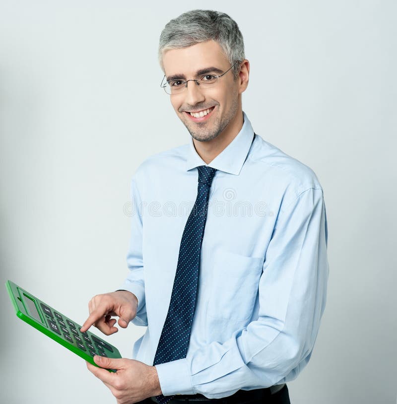 Man Showing Big Green Calculator Stock Photos - Free & Royalty-Free ...