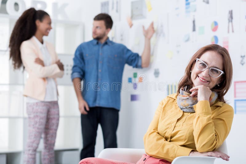 Corporate Trainer and Two Trainees Stock Image - Image of discussion ...