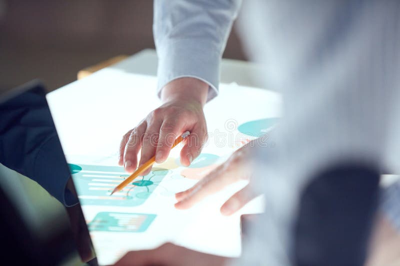 CEO Doing Presentation for Young Team Entrepreneurs, Using Laptop with ...