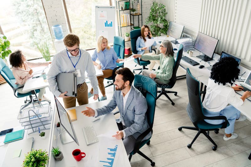 Modern Office Workspace with Professionals Collaborating and Engaging ...