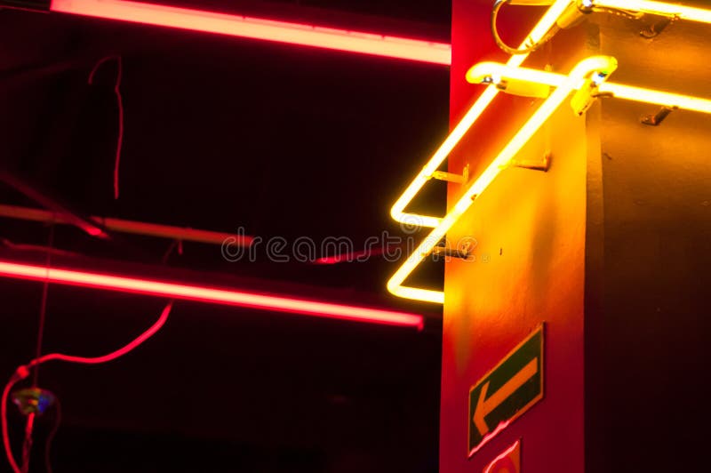 Corridor in Basement with Neon Lights Showing Way Stock Photo - Image ...