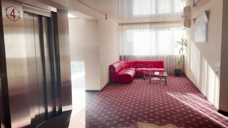 Corridor Doors, Elevators and Sofas in the Hotel. Coziness and Comfort ...