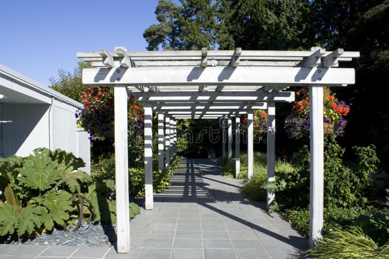 Corridor with Hanging Flowers Stock Photo - Image of front, outdoor ...