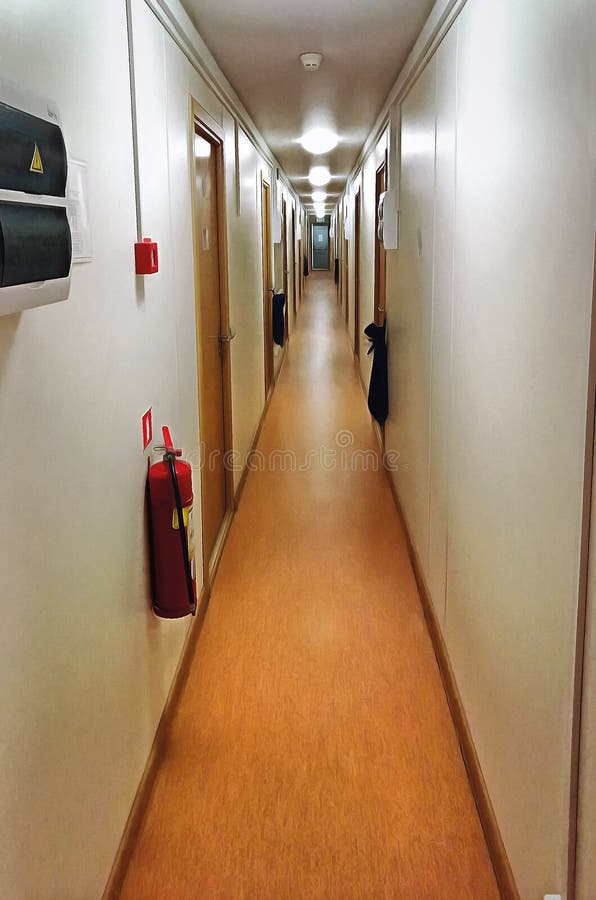 Corridor in the hostel stock image. Image of apartment - 152597647